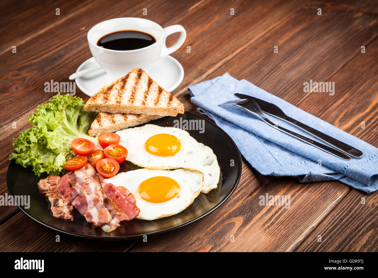 Traditional breakfast on a plate Stock Photo - Alamy