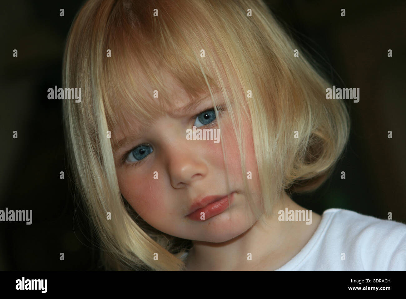 Young girl with a puzzled expression Stock Photo - Alamy