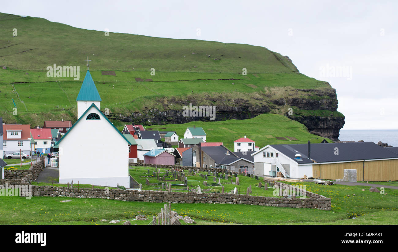 Village of Gjogv on the Faroe Islands with landscape and church Stock ...
