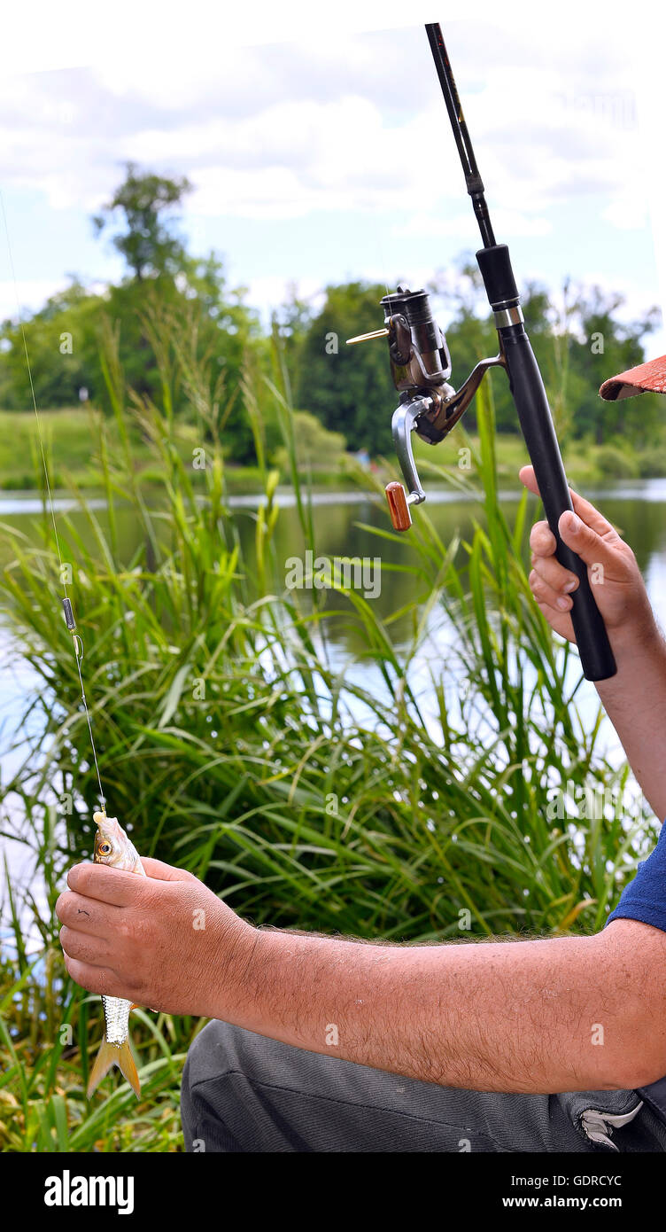 Angler sitting on beach hi-res stock photography and images - Alamy