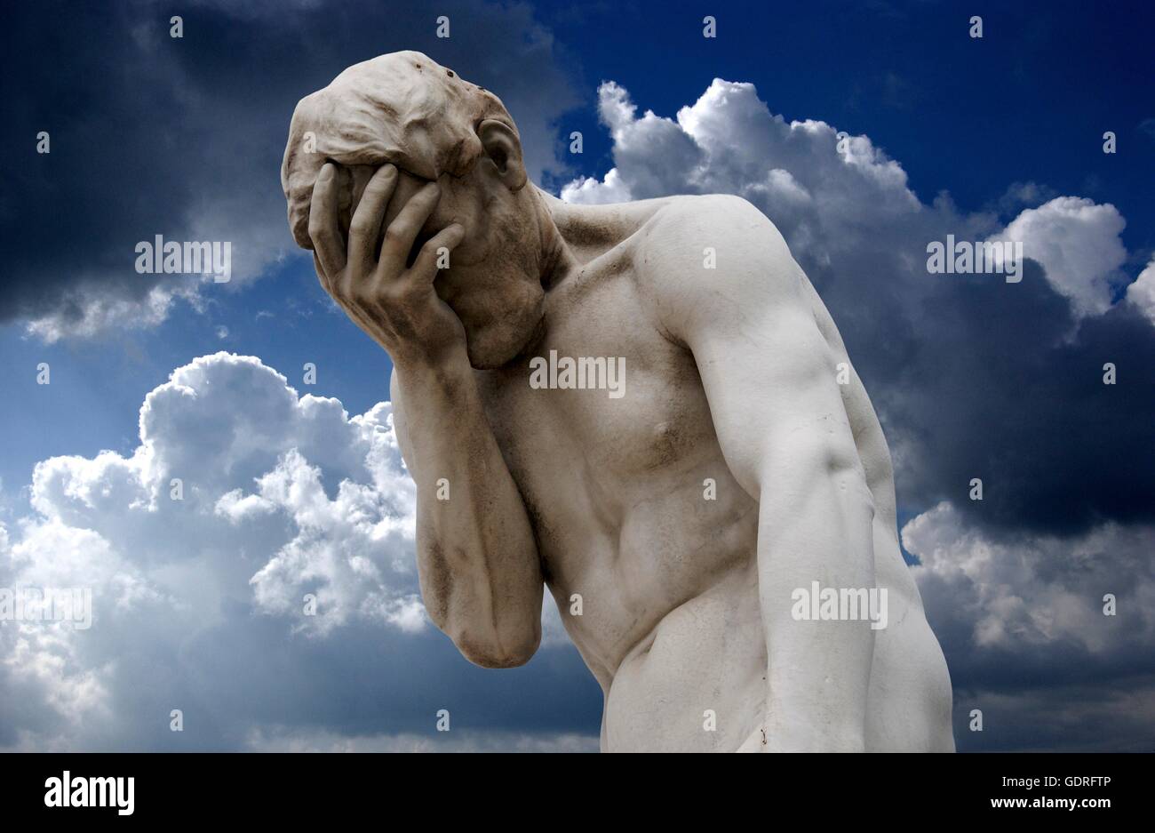 Statue and clouds Stock Photo - Alamy