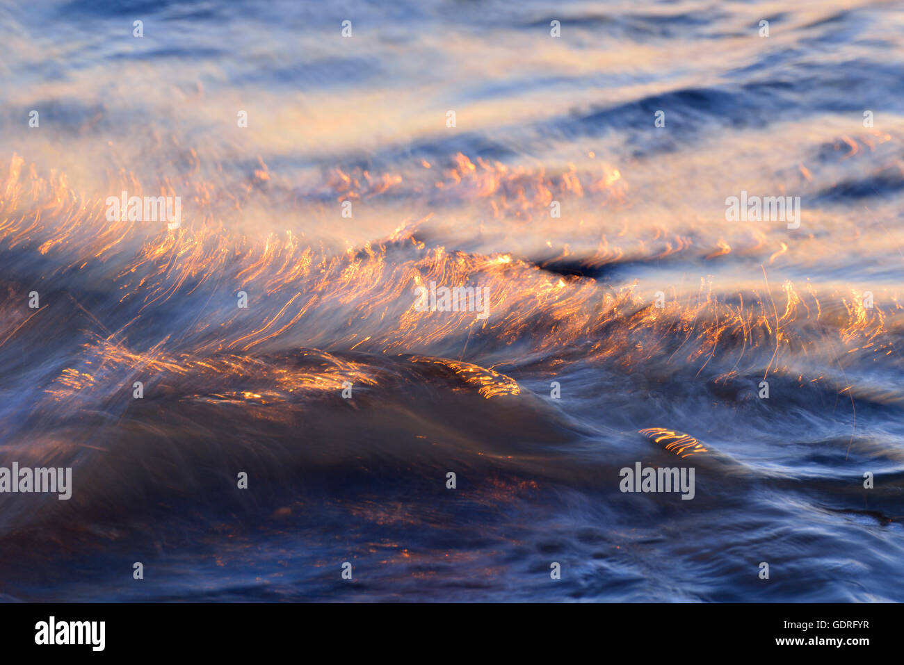 Light refracted in a wave in the Baltic Sea, abstract illustration ...