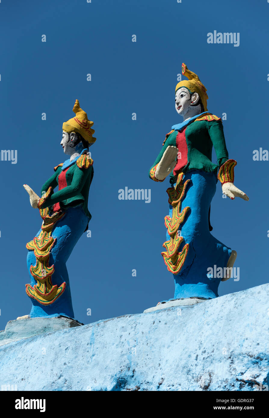 Colourful statues at Bayin Nyi, cave temple and hot springs, Mon State ...