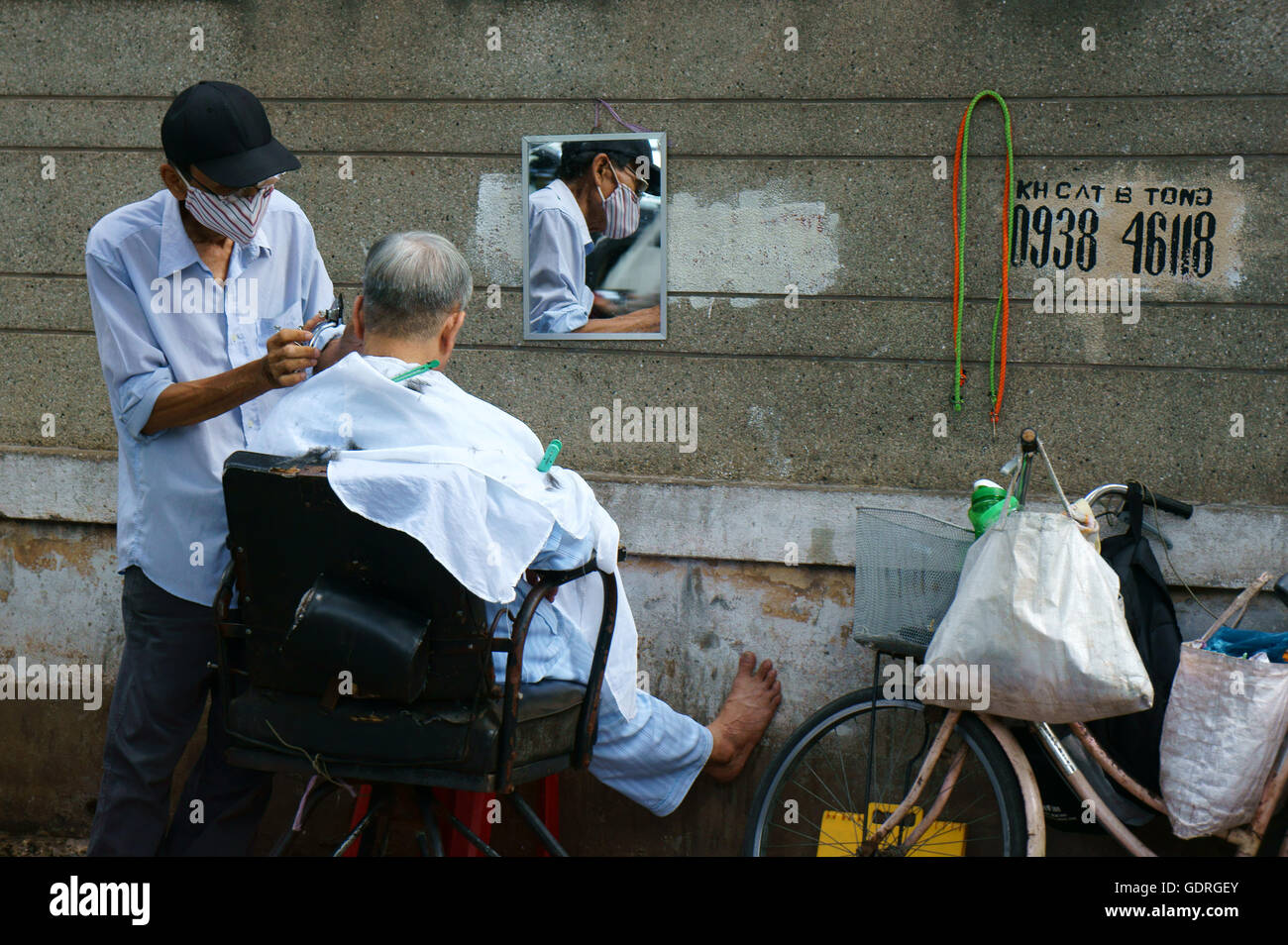 Traditional lifestyle of poor people in Asia urban, Vietnamese male ...