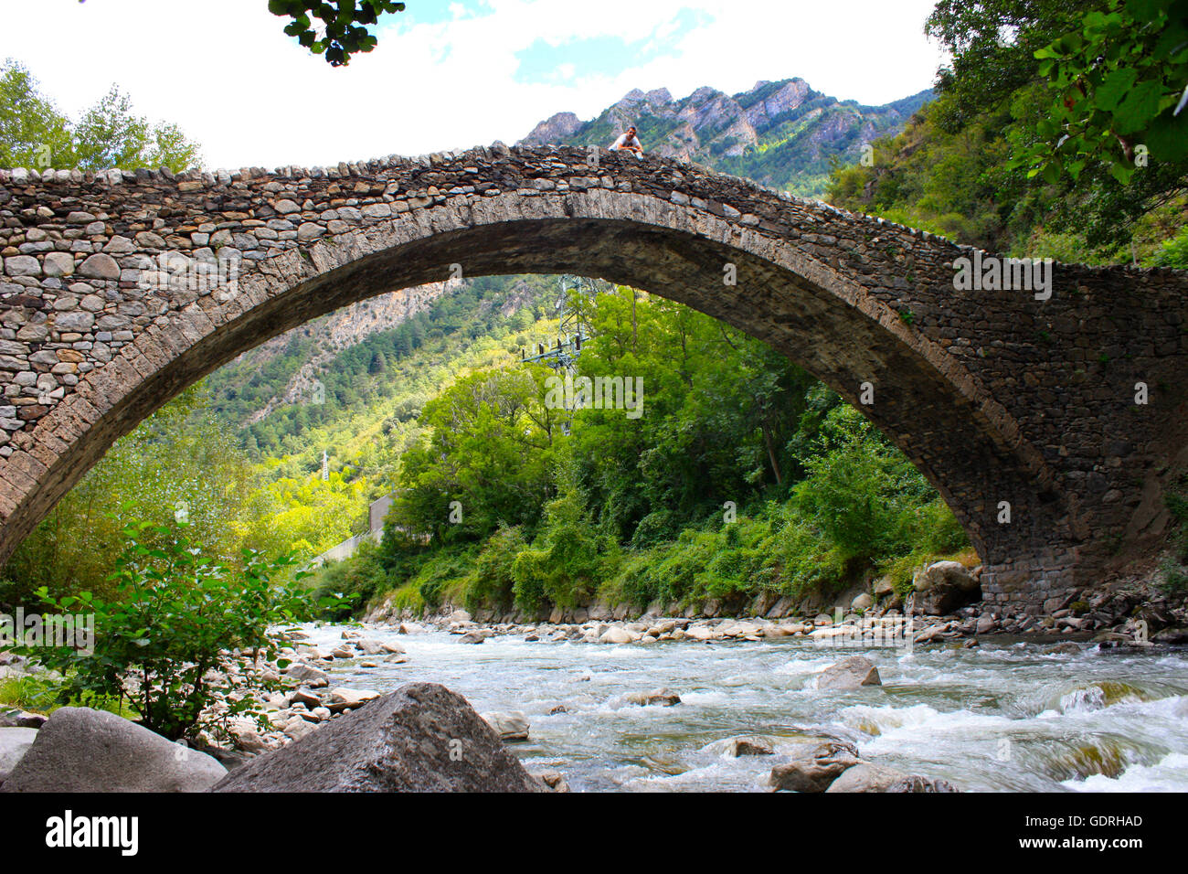 Stone bridge in a Spanish river Stock Photo - Alamy