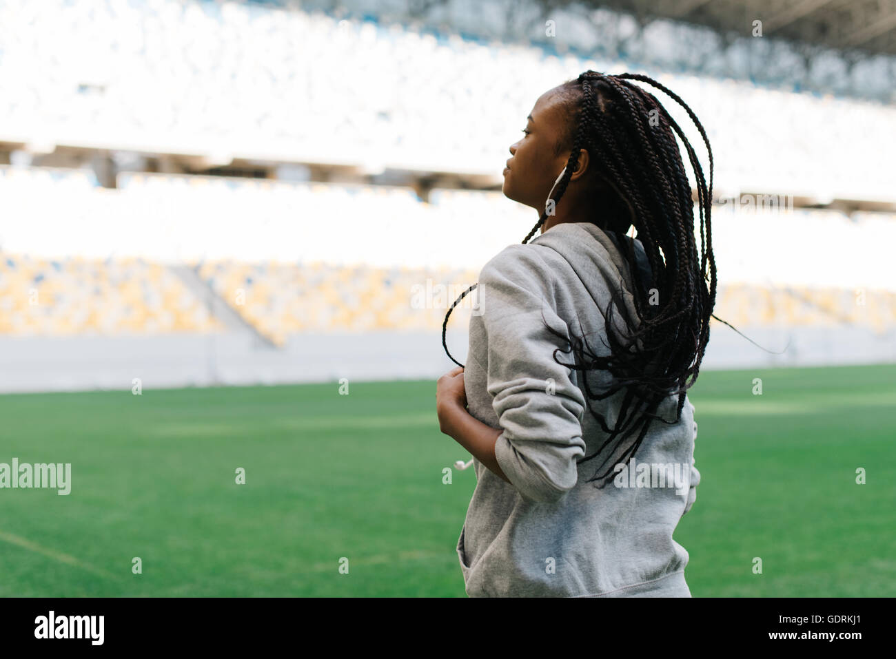 Side portrait of healthy natural looking african american woman running ...