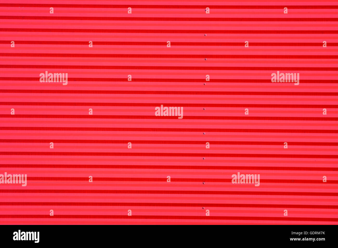 Red corrugated metal siding Stock Photo - Alamy
