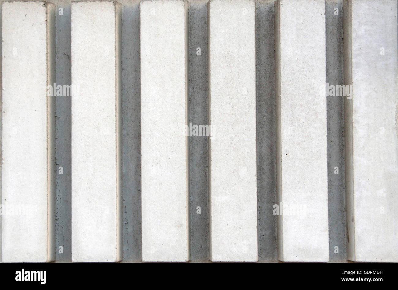 Small element of concrete in a Wall Stock Photo - Alamy