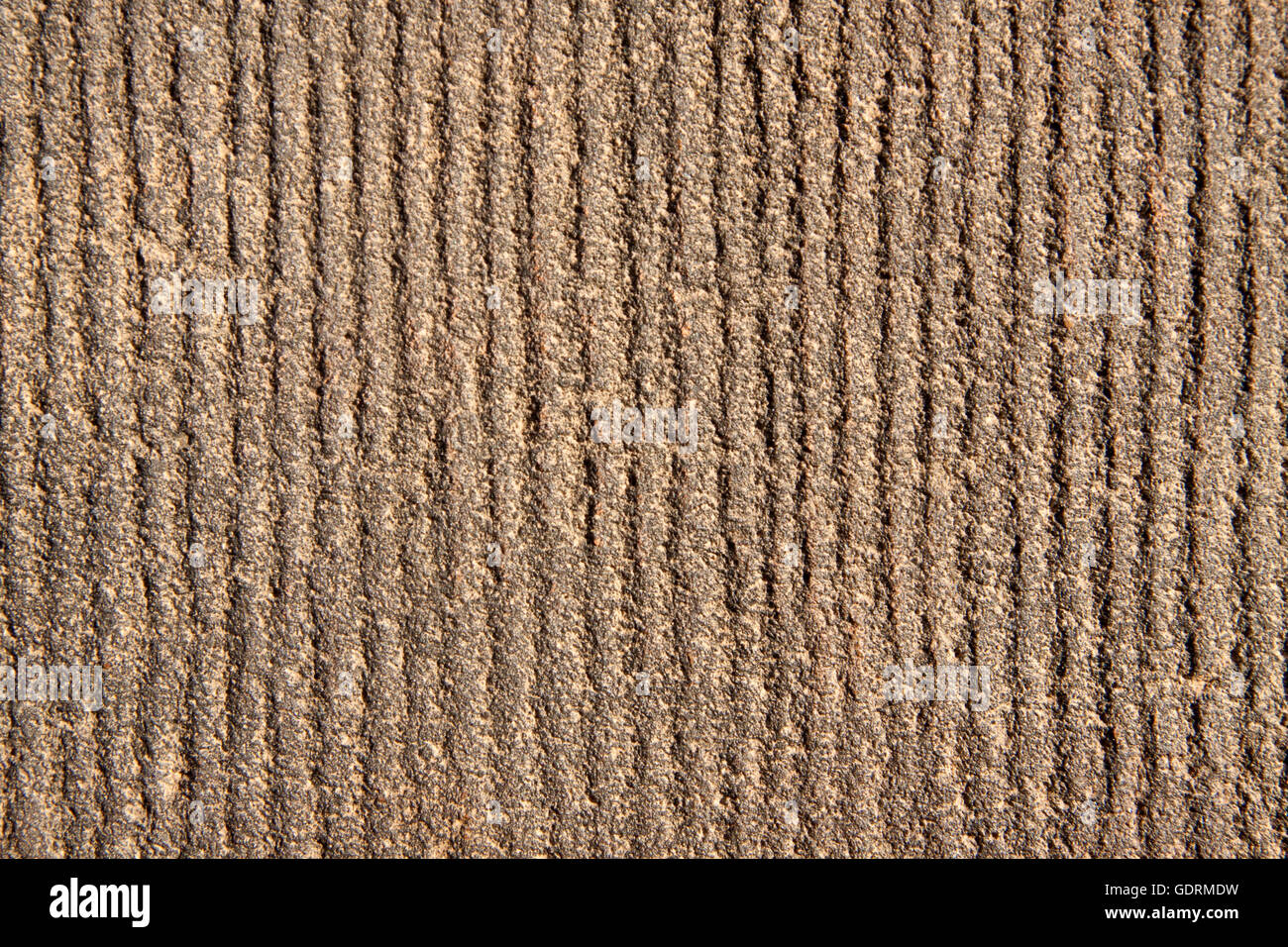 Straight vertical grooves in stone - Background image Stock Photo - Alamy