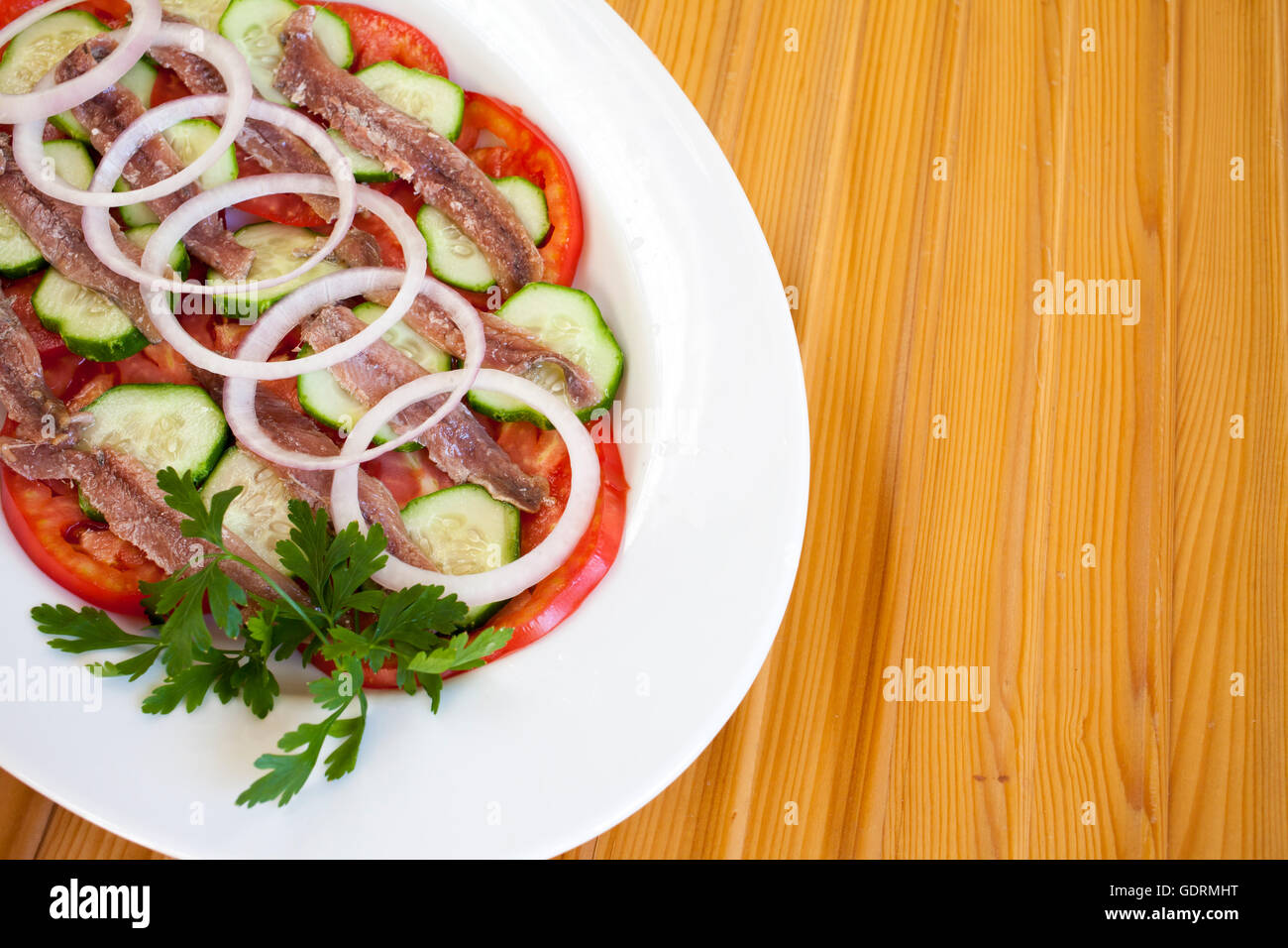 Salted anchovy fillets with Mediterranean spices and herbs Stock Photo ...
