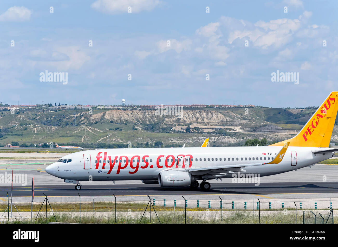 Aircraft -Boeing 737- of -Pegasus Airlines- airline, direction to runway of Madrid-Barajas ...