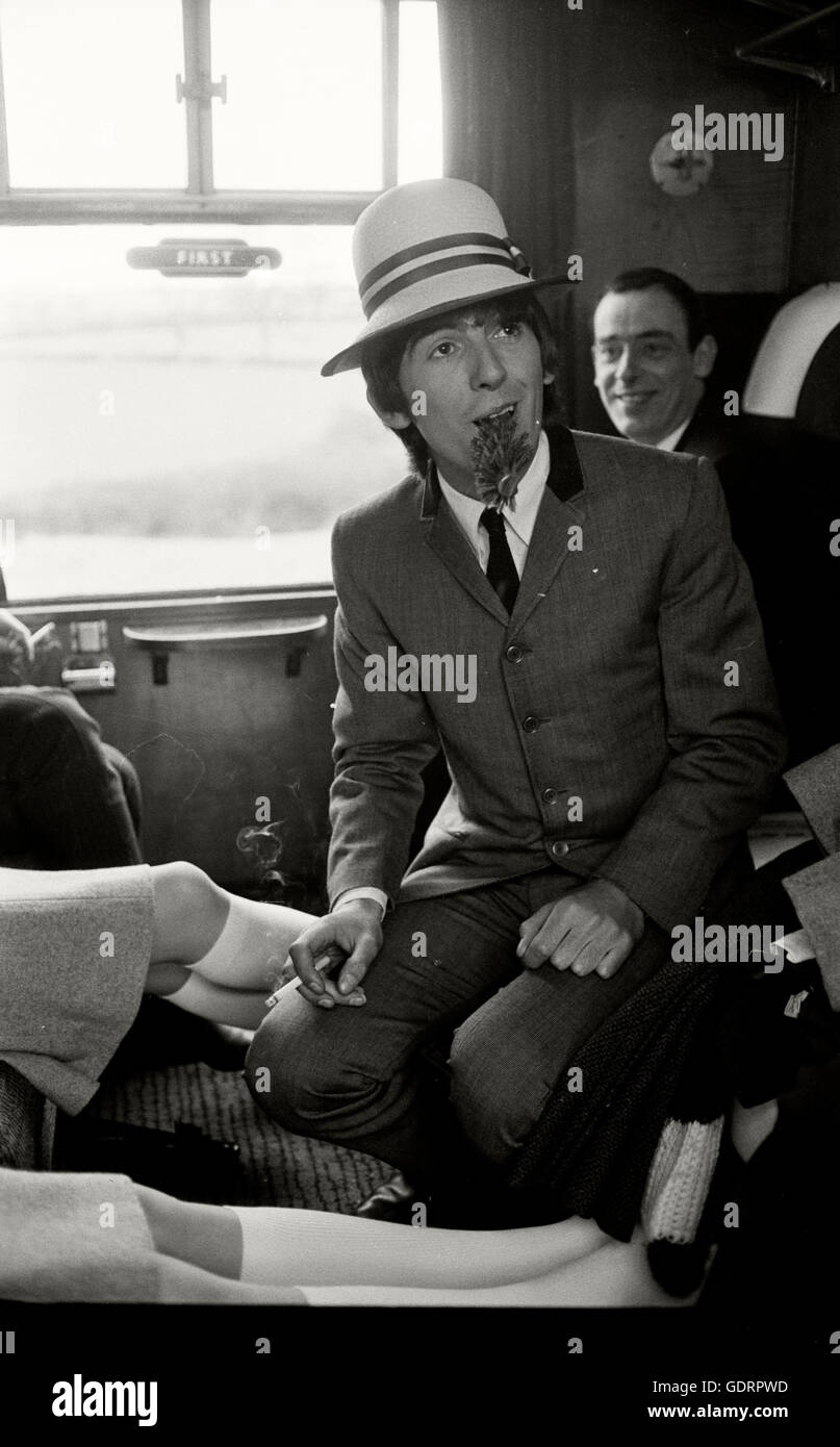 Georg Harrison with John Junkin on a Hard Days Night Train Stock Photo ...