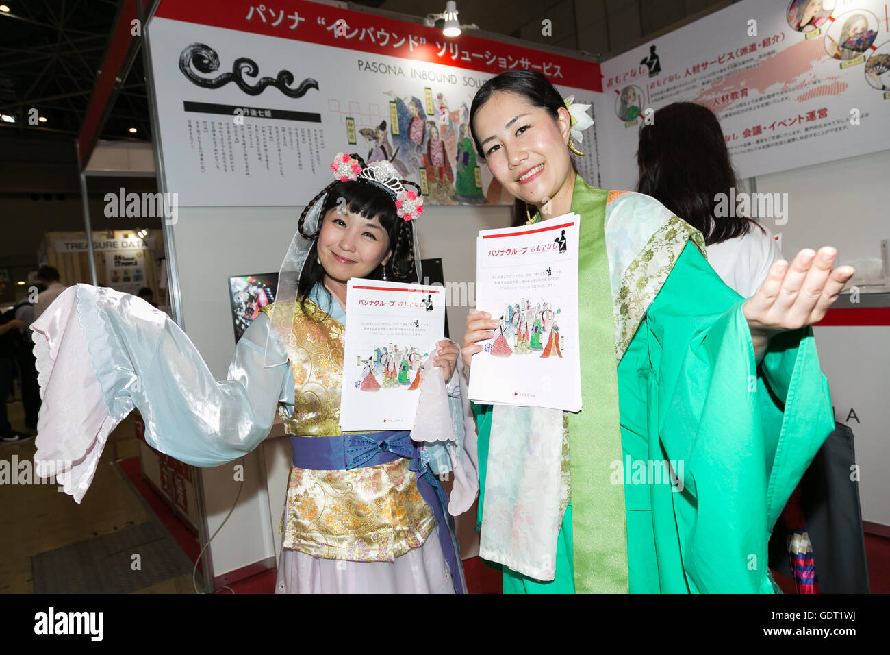 Tokyo, Japan. 21st Jul, 2016. Exhibitors pose for a photograph during ...
