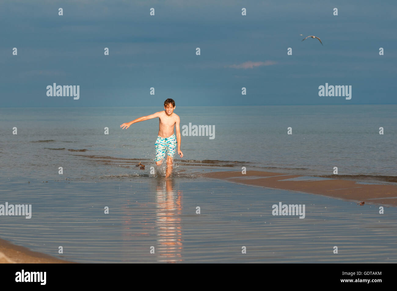 Running through water splash hi-res stock photography and images - Alamy