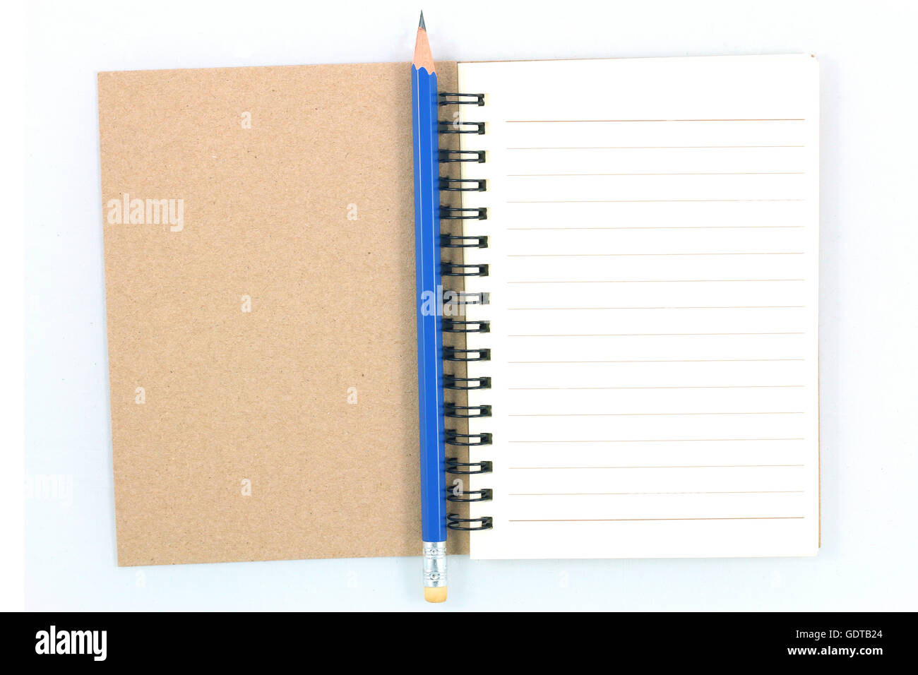 pencil and notebook on white background Stock Photo - Alamy
