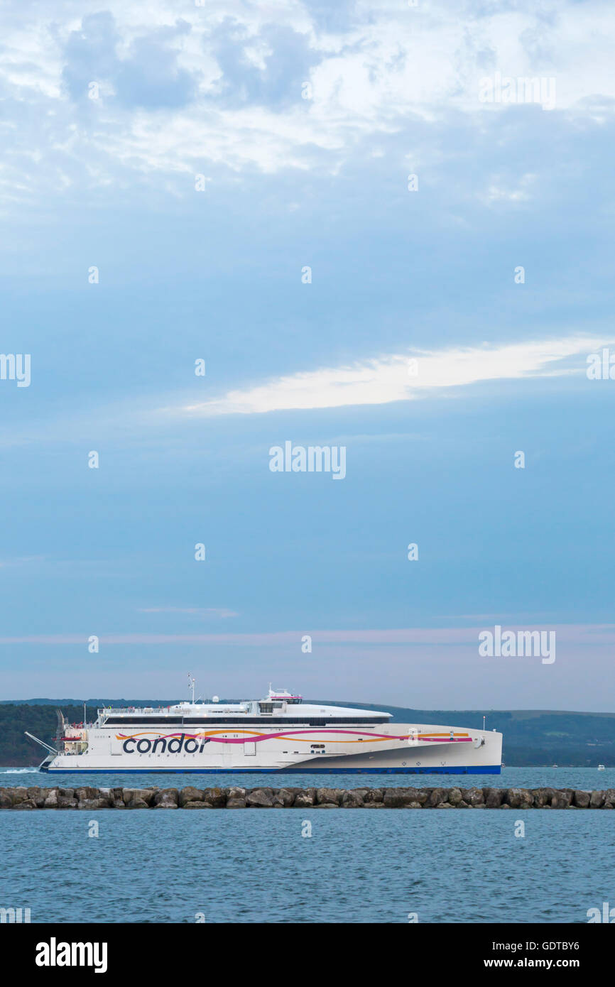 Condor Liberation high speed fast ferry sailing into Poole at Poole Harbour in July Stock Photo ...
