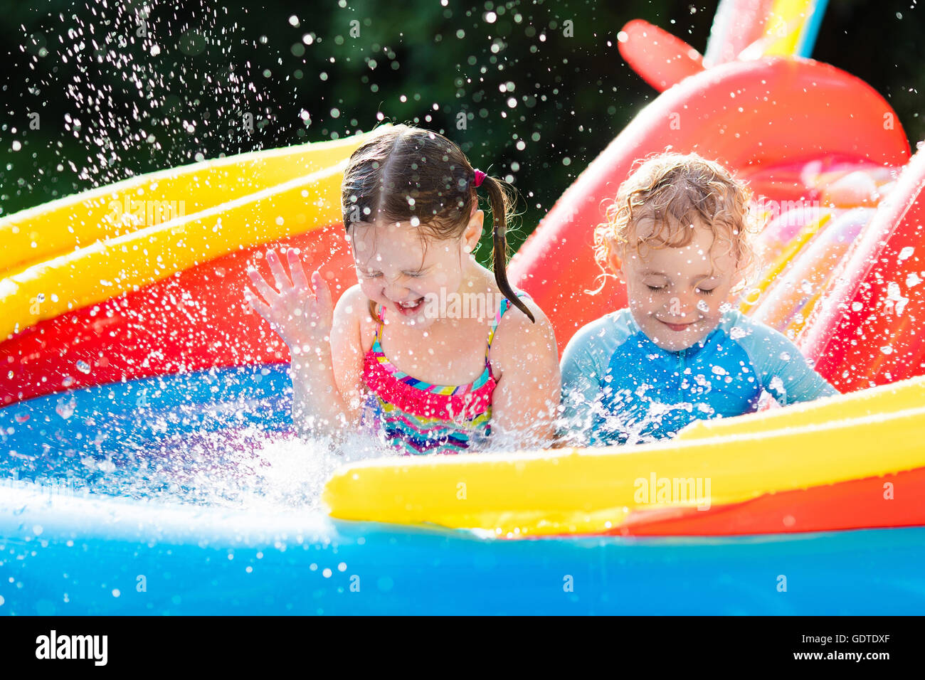 Children Playing In Inflatable Baby High Resolution Stock Photography ...