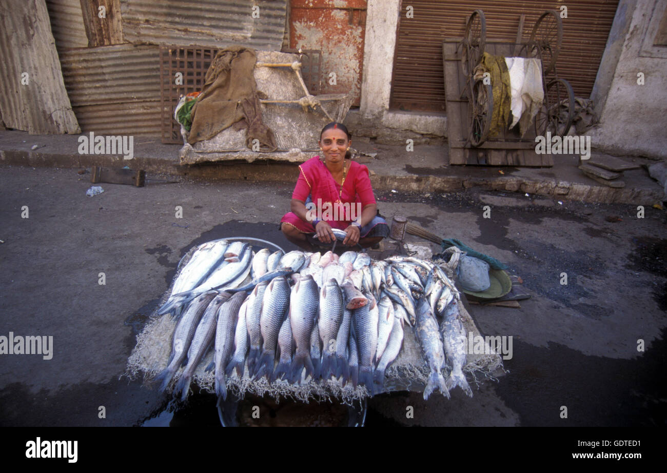 a women sales fish at the market in the city of Surat in the Province ...