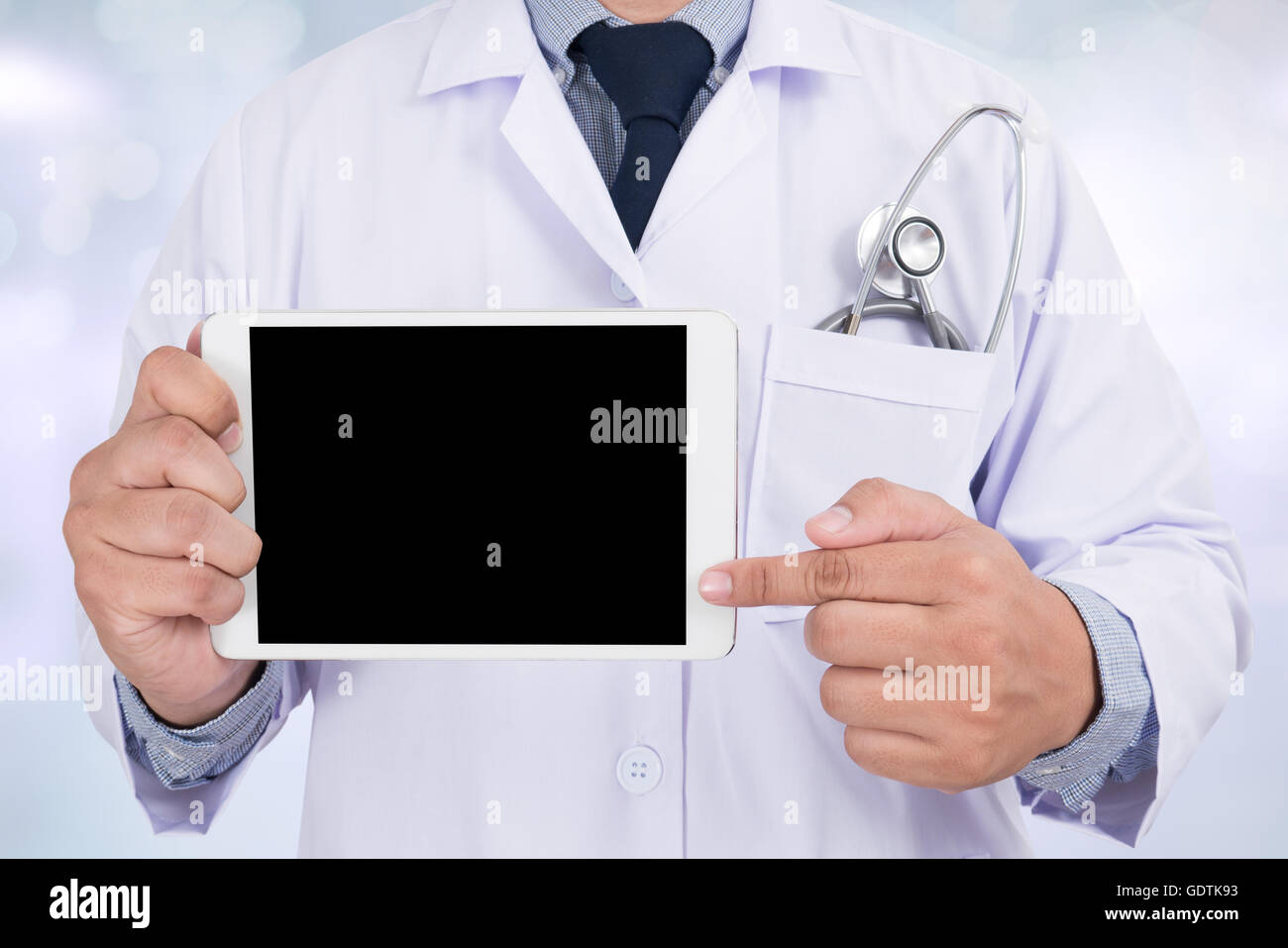 Doctor showing small white sign hi-res stock photography and images - Alamy