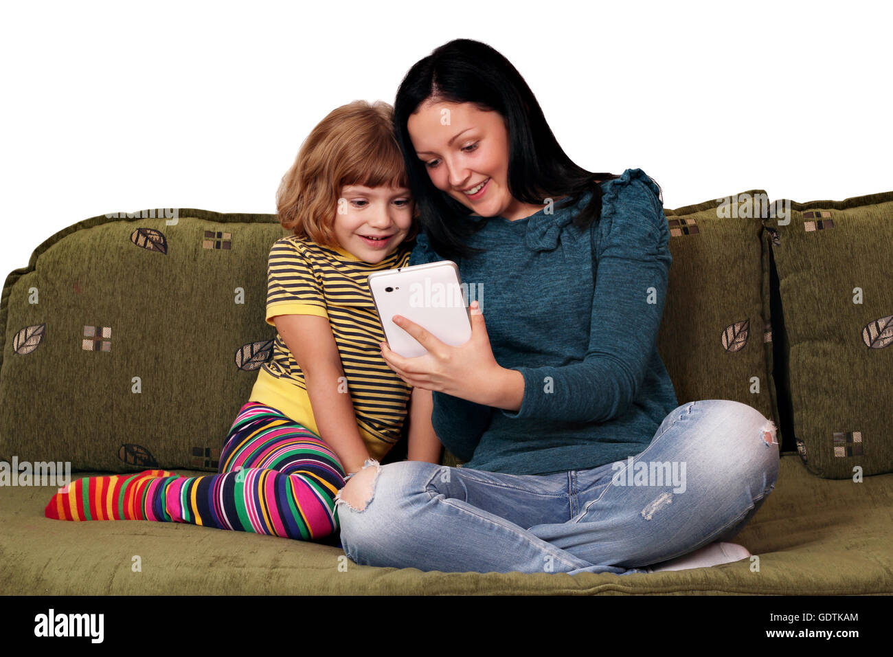teenage and little girl playing with tablet pc Stock Photo - Alamy