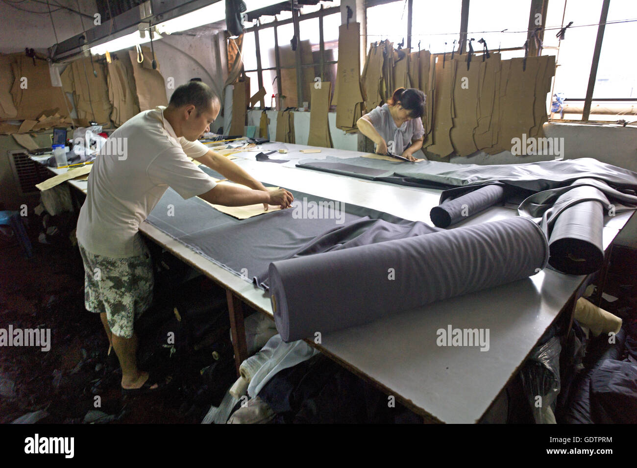 China garment factory hi-res stock photography and images - Alamy