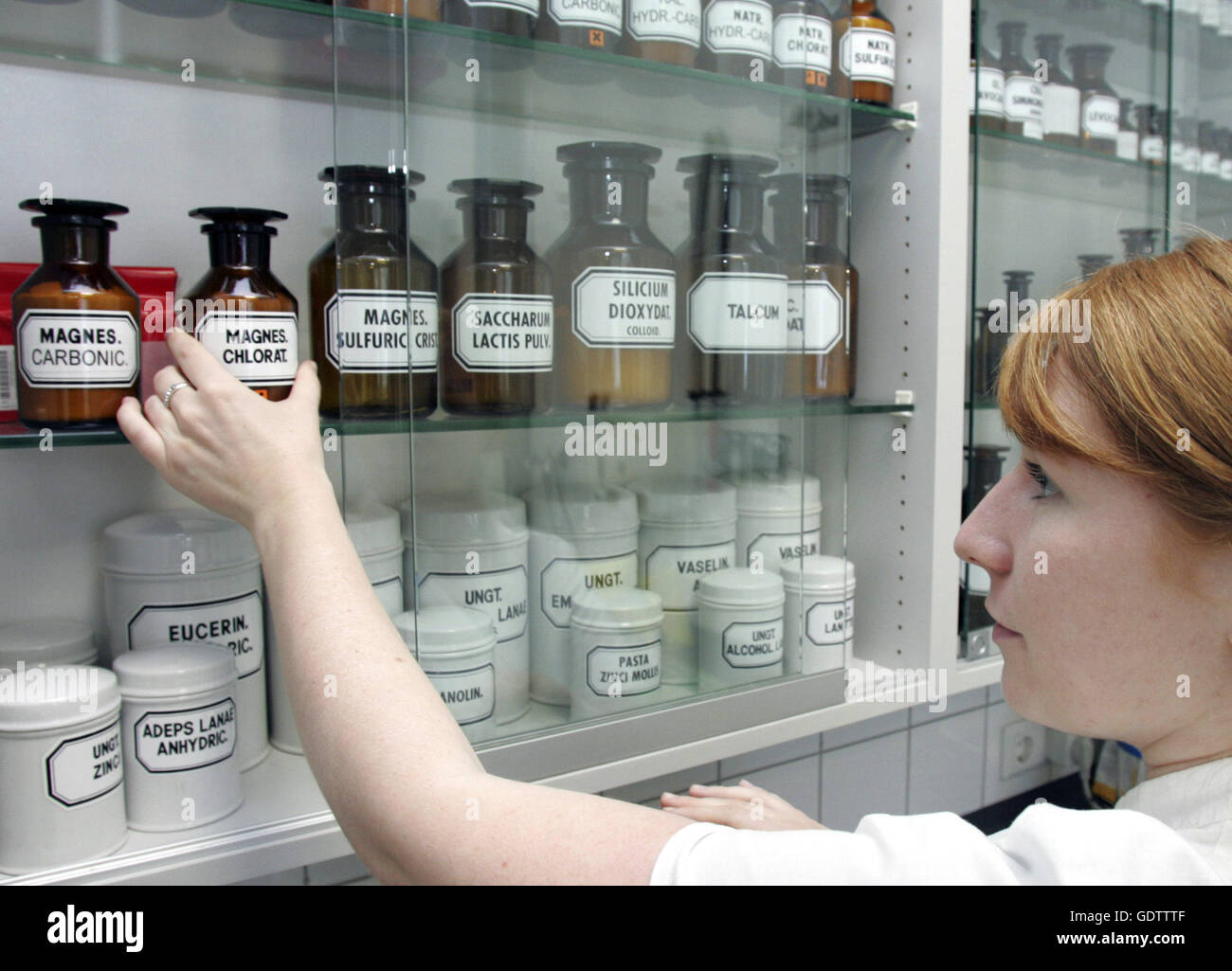 A pharmacist arranging drugs Stock Photo - Alamy