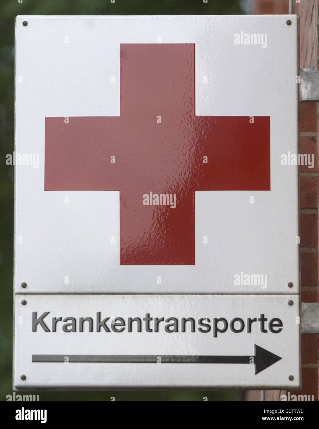 Red cross with patient transport indication sign hi-res stock ...