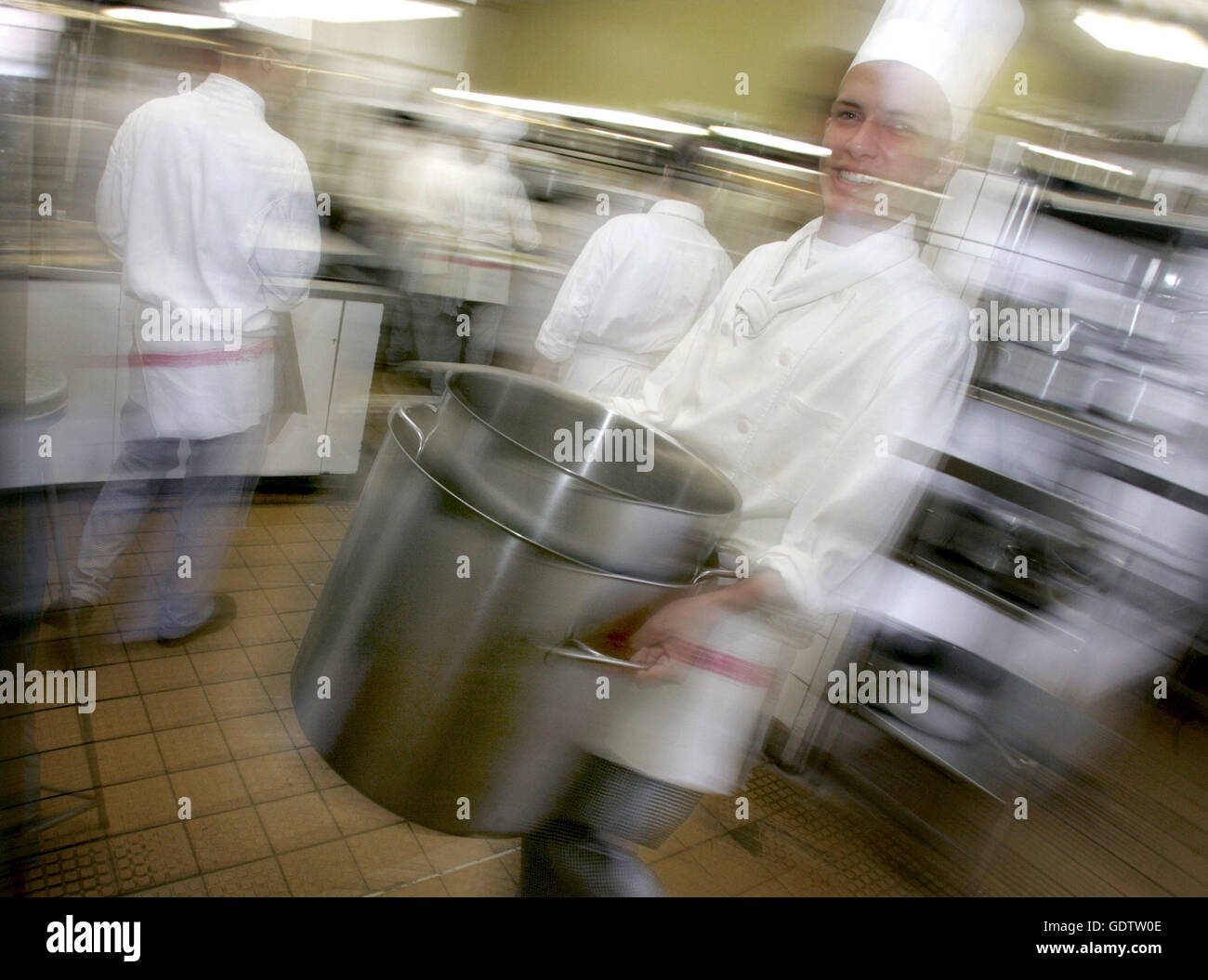 Apprentice chefs in a canteen kitchen Stock Photo - Alamy