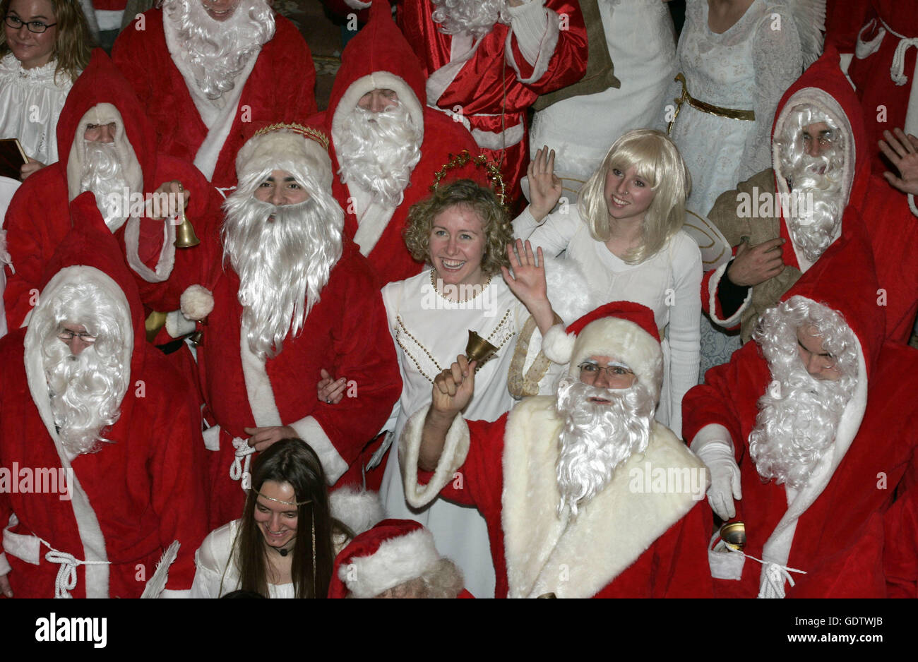Santa and angel convention Stock Photo - Alamy