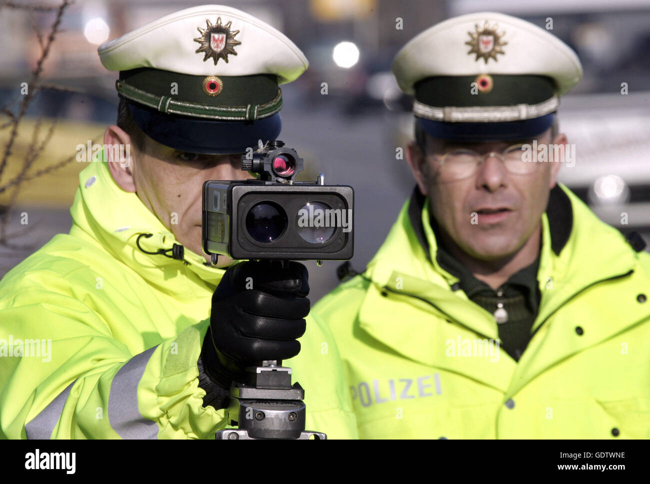 Police check with laser gun Stock Photo - Alamy