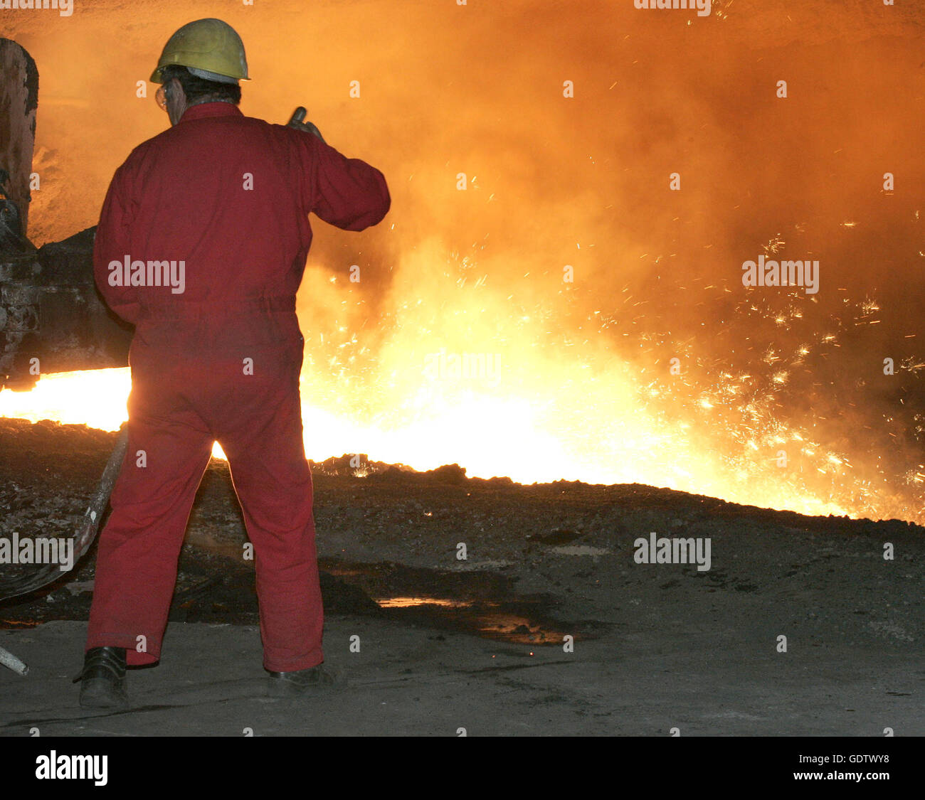 Tapping workers hi-res stock photography and images - Alamy