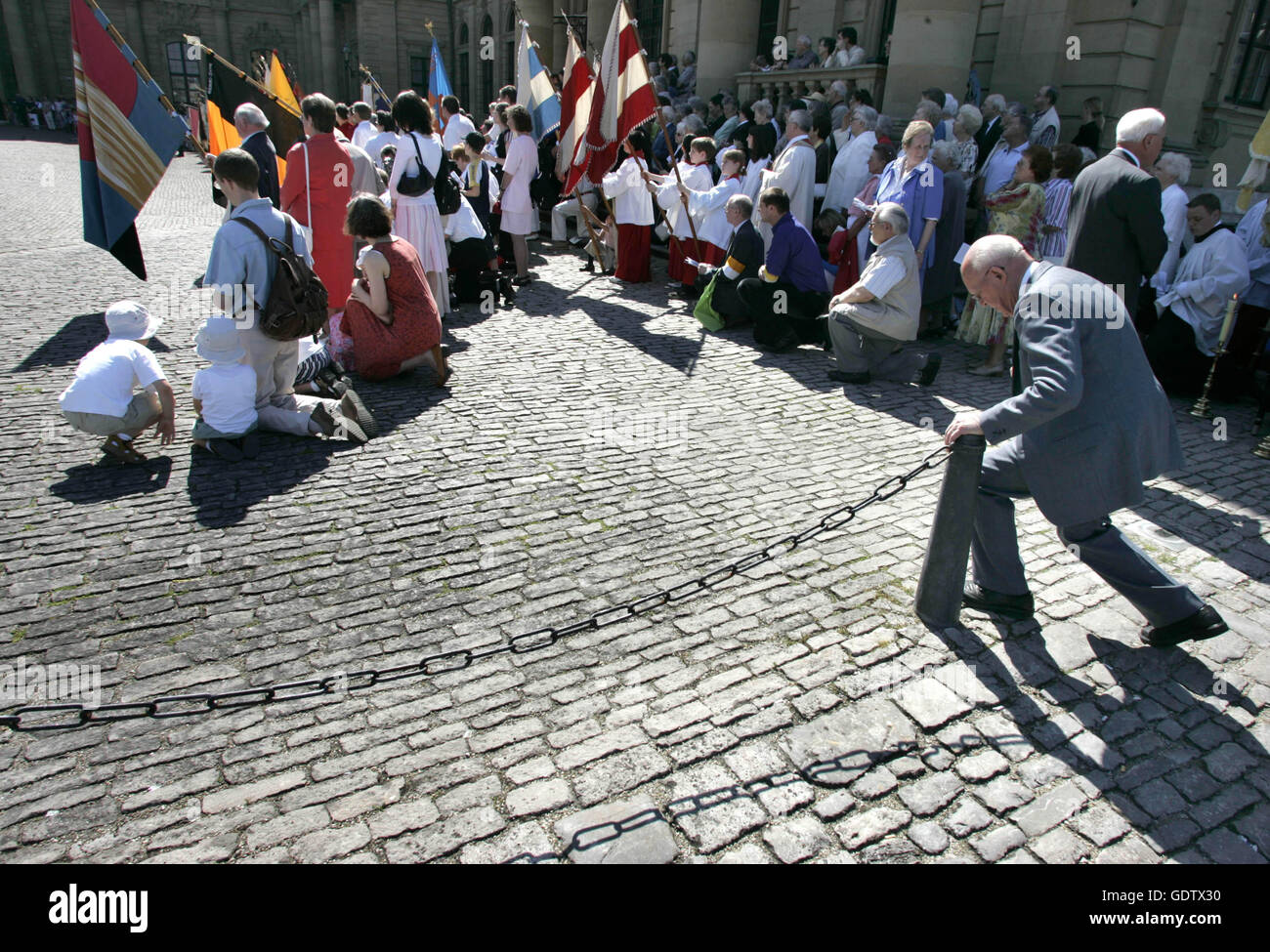 Christians pray during procession hi-res stock photography and images ...