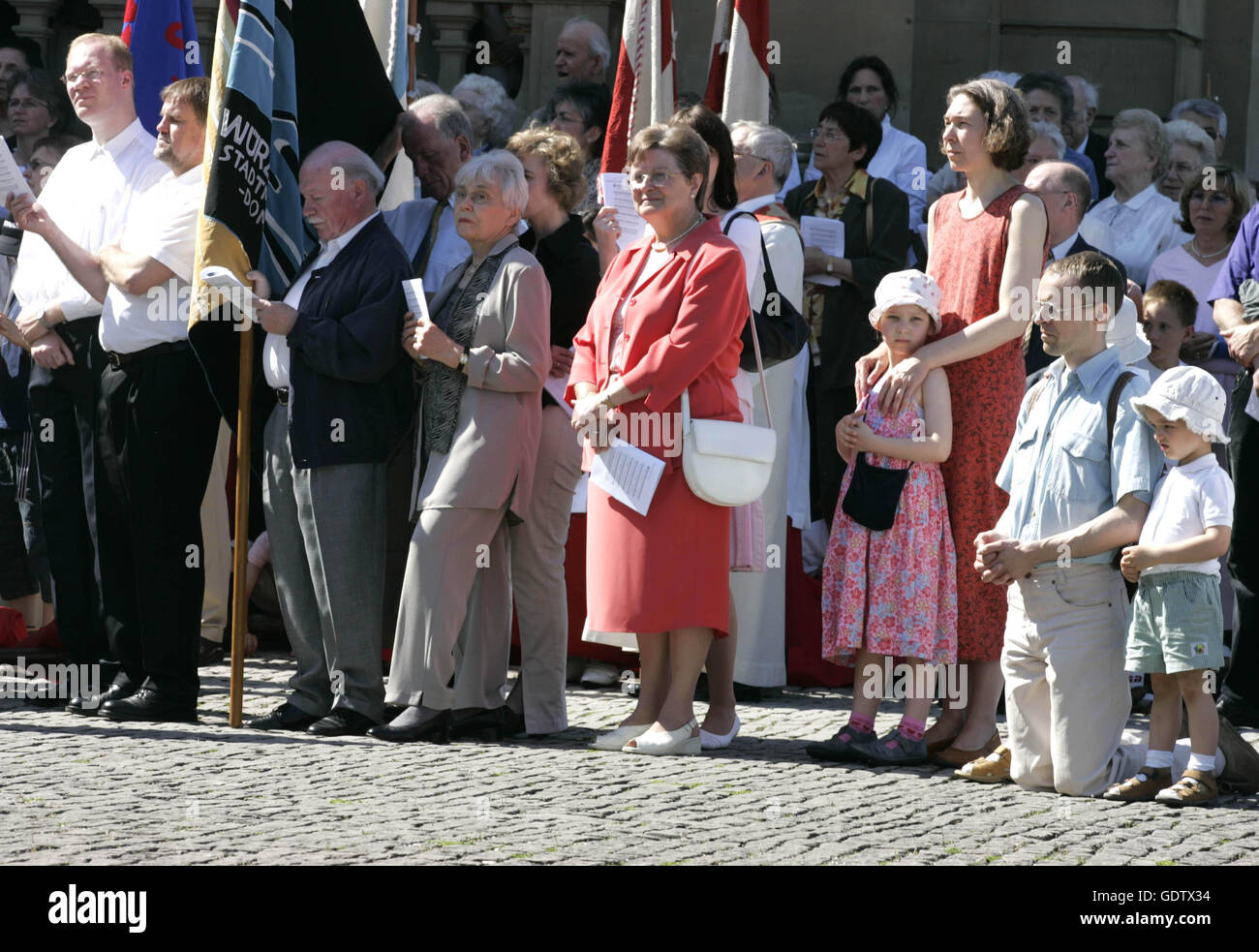 Christians pray during procession hi-res stock photography and images ...
