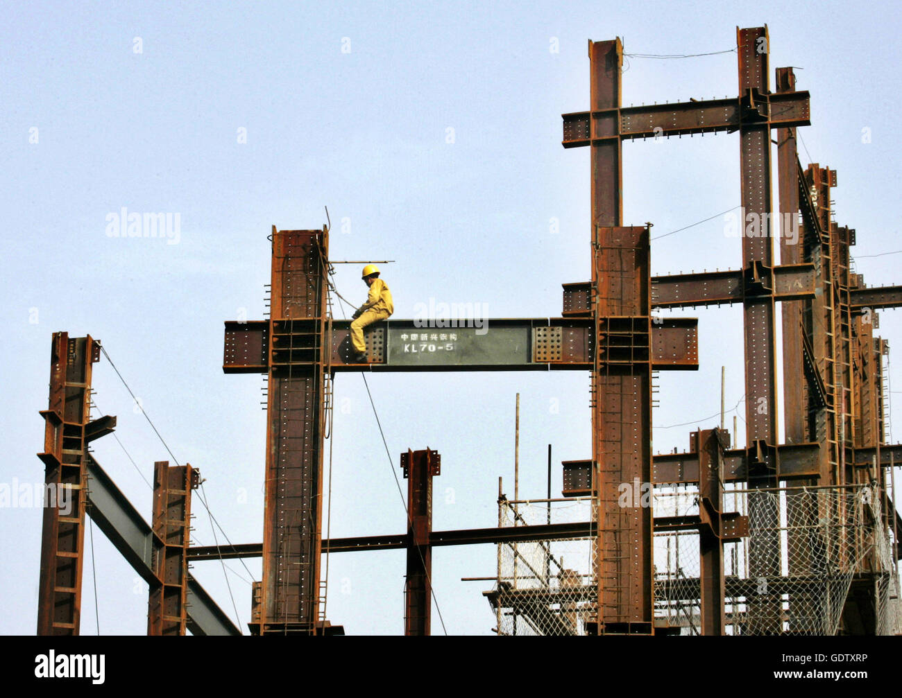 Construction worker on a steel framework Stock Photo - Alamy