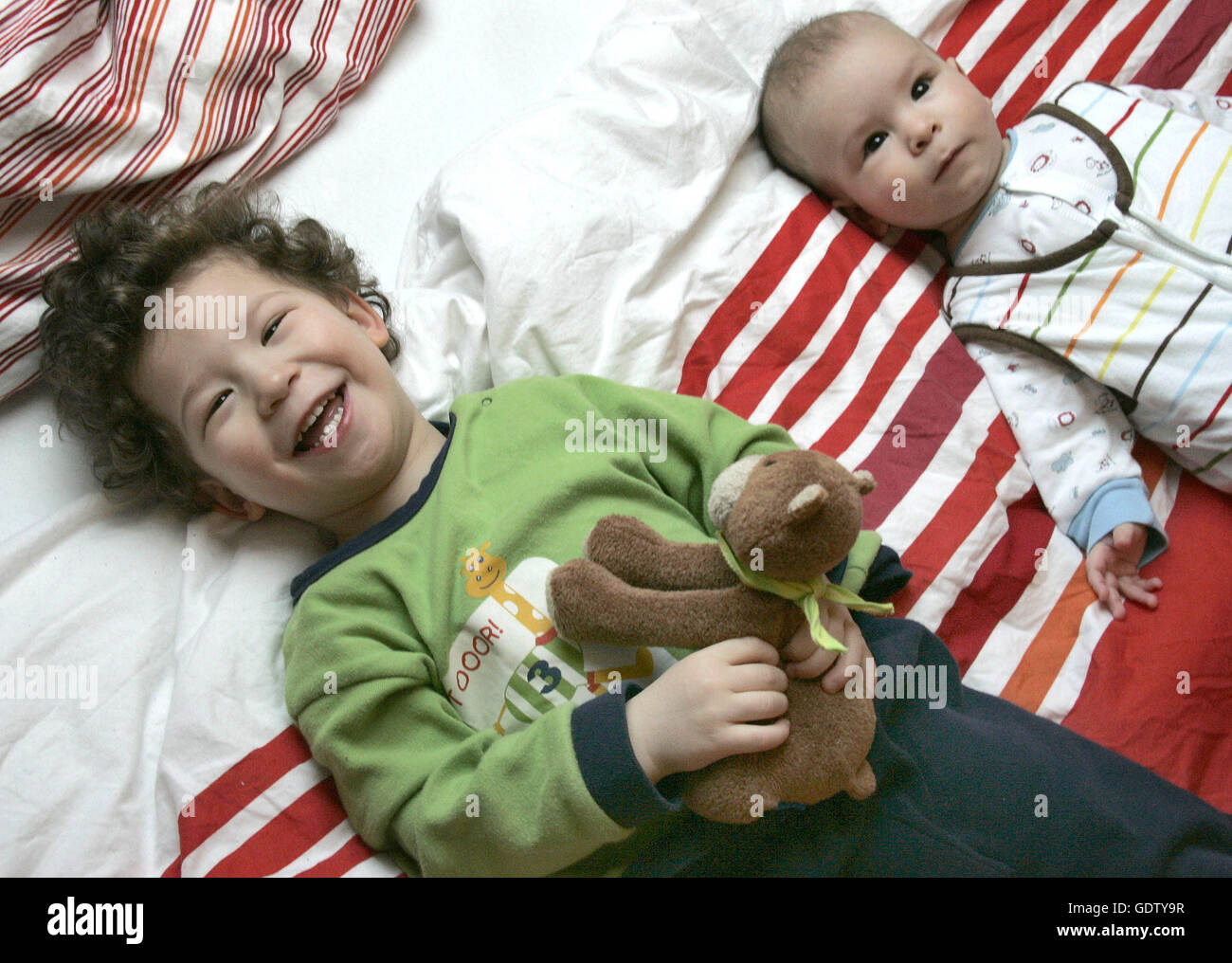 A little boy and a baby Stock Photo - Alamy