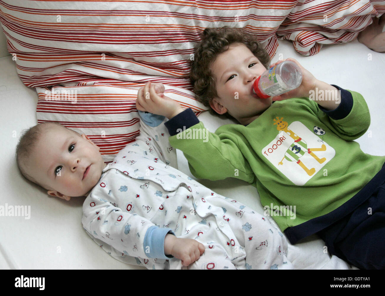 A little boy and a baby Stock Photo - Alamy