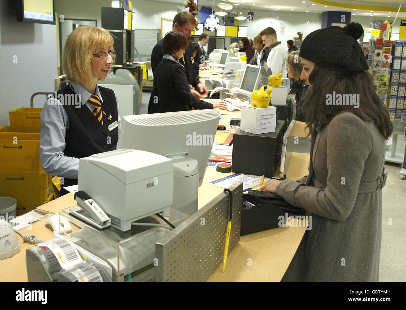 17 12 08 customers at post office counters hi-res stock photography and ...