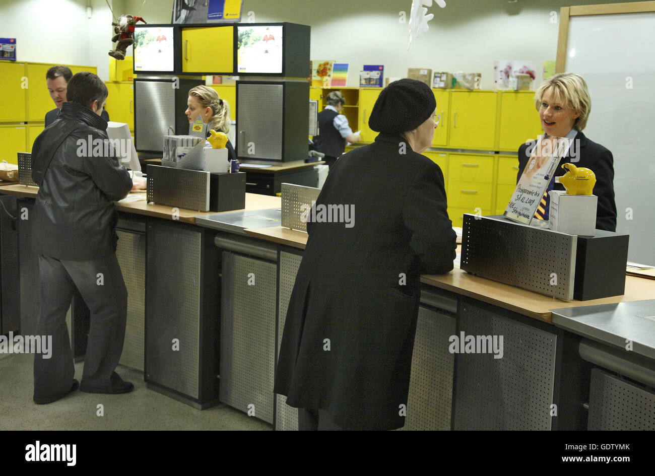 17 12 08 customers in a branch of deutsche post ag hi-res stock ...