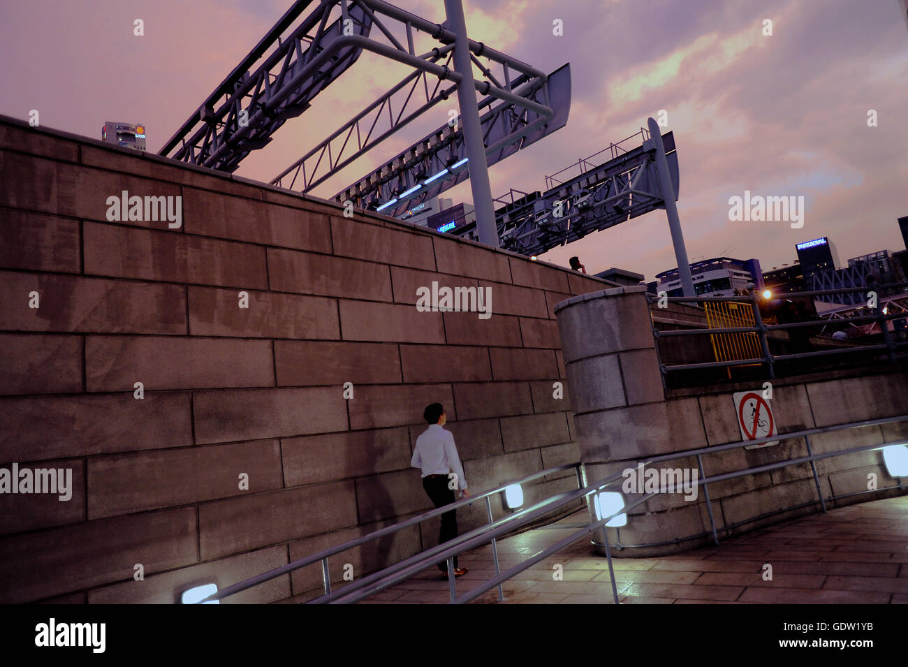 Man in front of a wall Stock Photo - Alamy