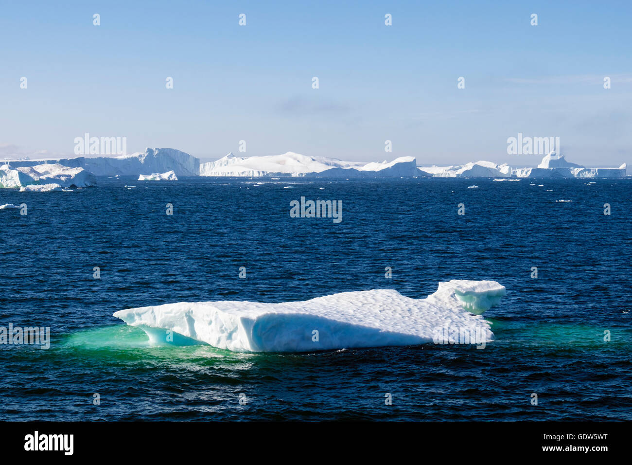 Iceberg floating out to sea ocean above Arctic Circle from Ilulissat ...