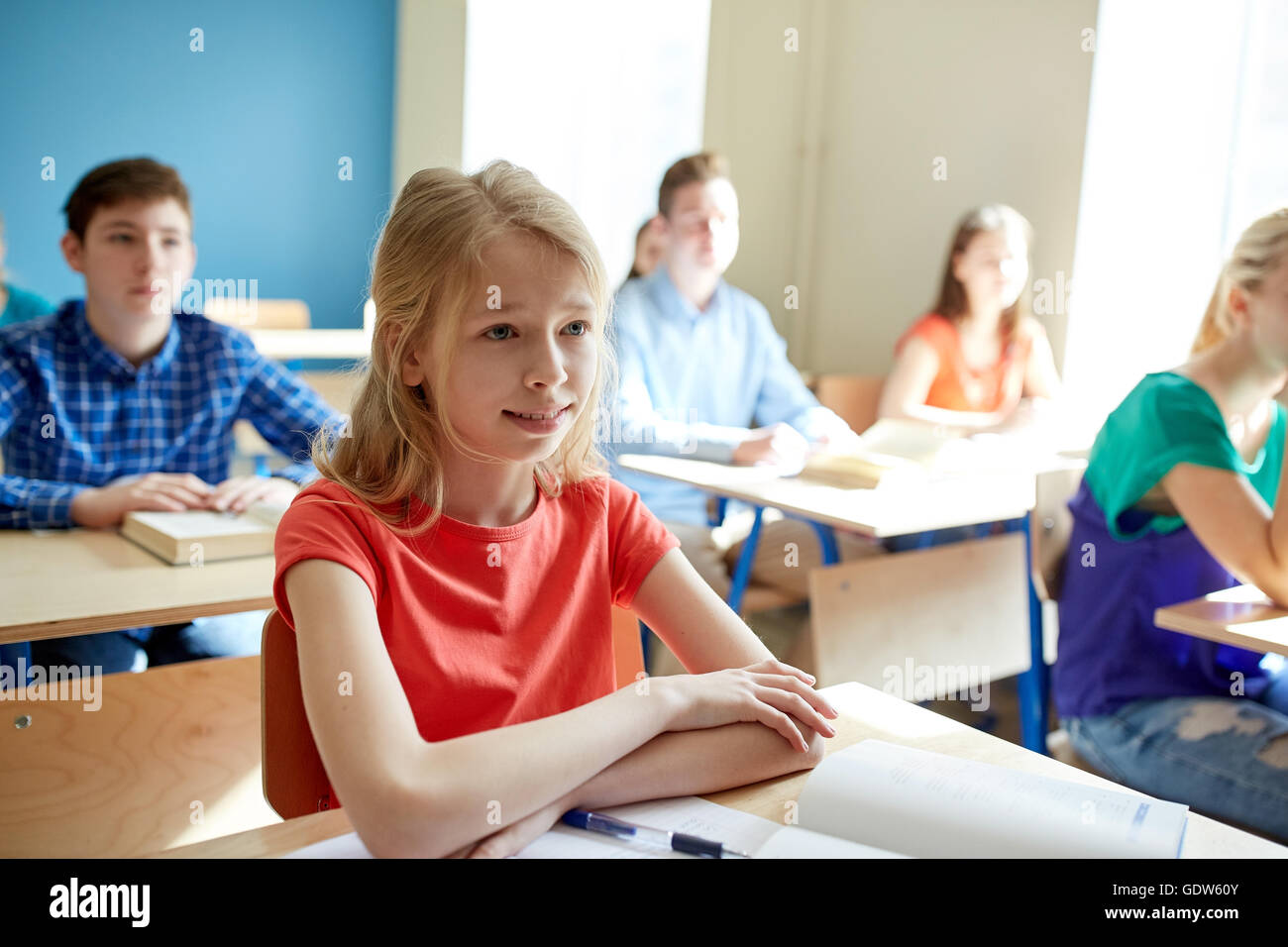 happy student girl at school lesson Stock Photo - Alamy