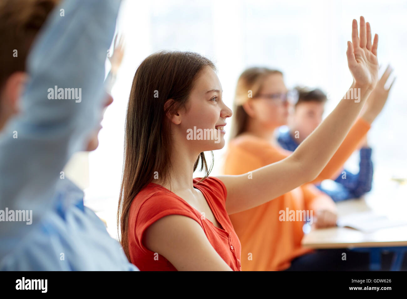 group of students with notebooks at school lesson Stock Photo - Alamy