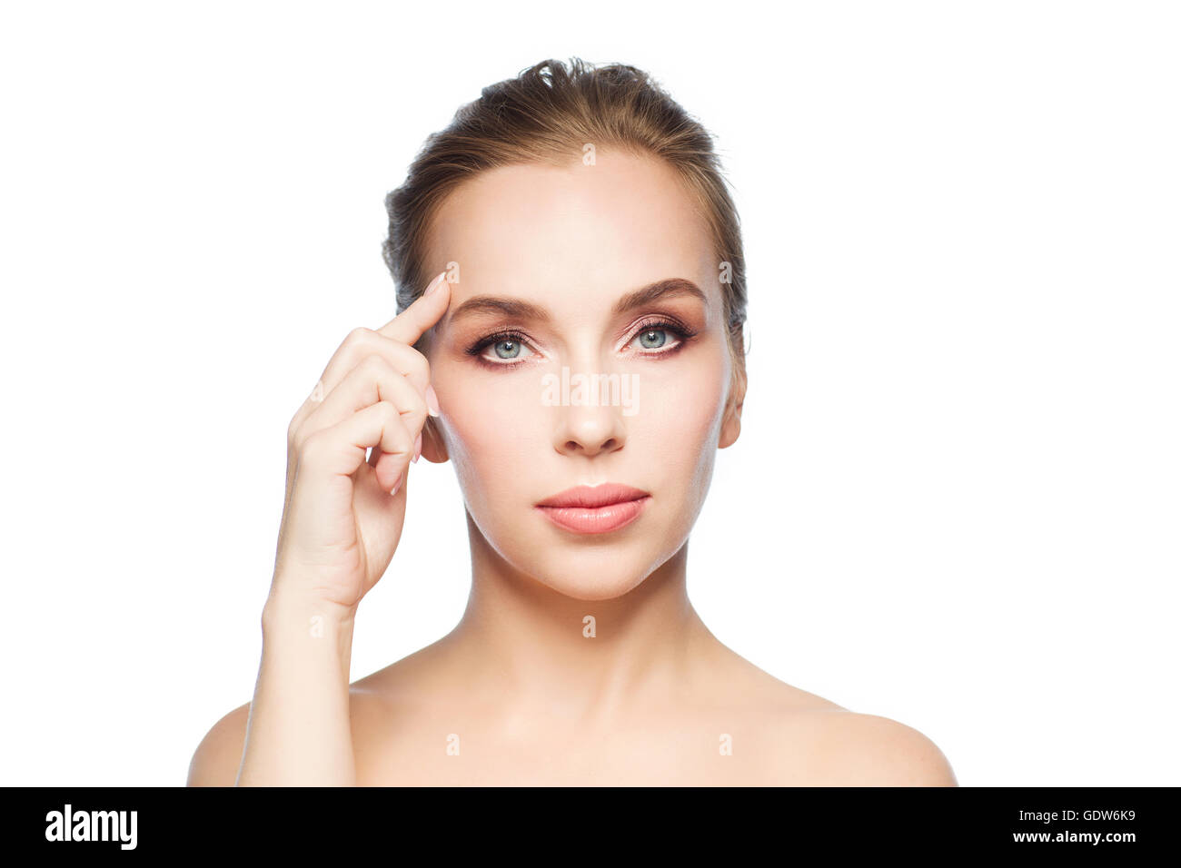 beautiful young woman showing her forehead Stock Photo - Alamy