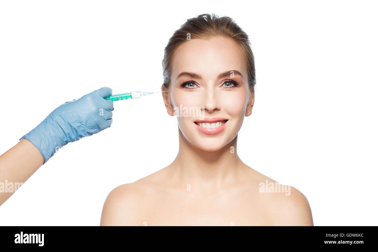 woman face and hand with syringe making injection Stock Photo - Alamy