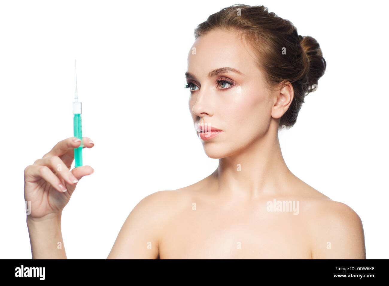 beautiful woman holding syringe with injection Stock Photo - Alamy
