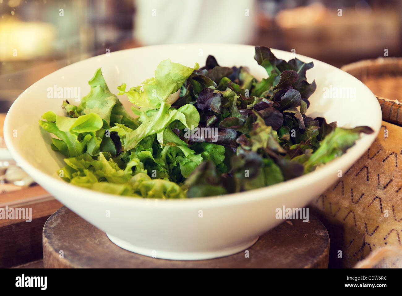 bowl of green salad lettuce at asian restaurant Stock Photo - Alamy