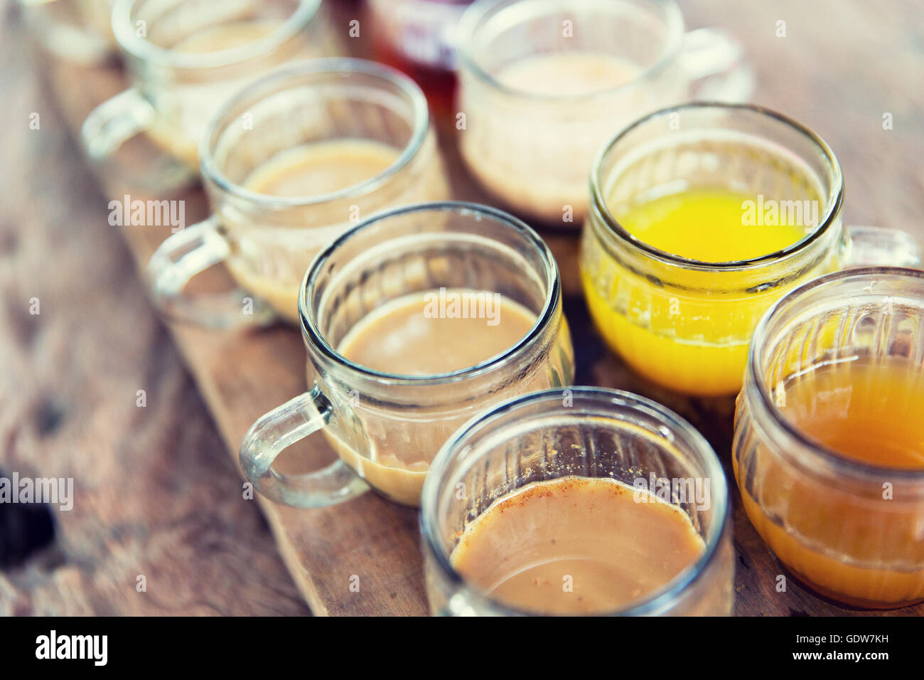 glasses of drinks at market stall or restaurant Stock Photo - Alamy