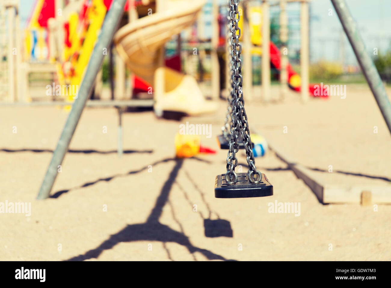 close up of swing on playground outdoors Stock Photo - Alamy