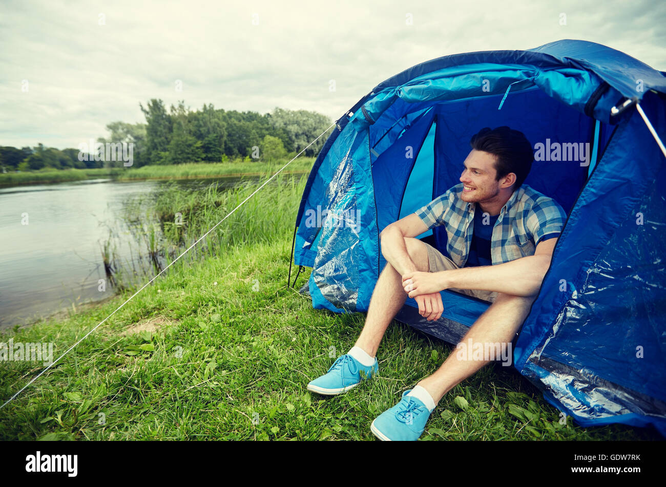 Male camper man camping hi-res stock photography and images - Alamy