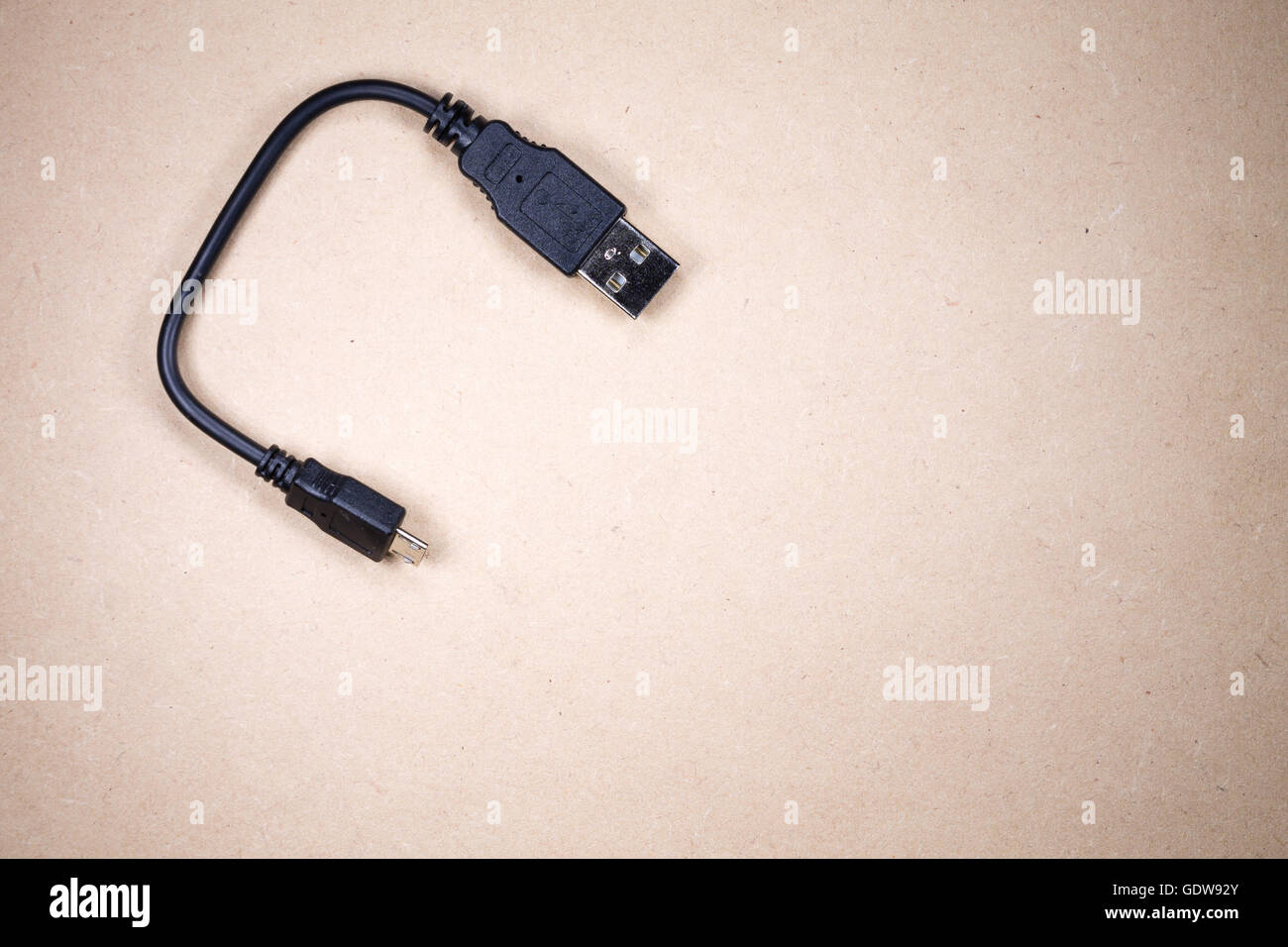 Usb plug isolated over wodden background Stock Photo - Alamy